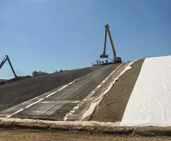 Geotextile surface sealing of landfills